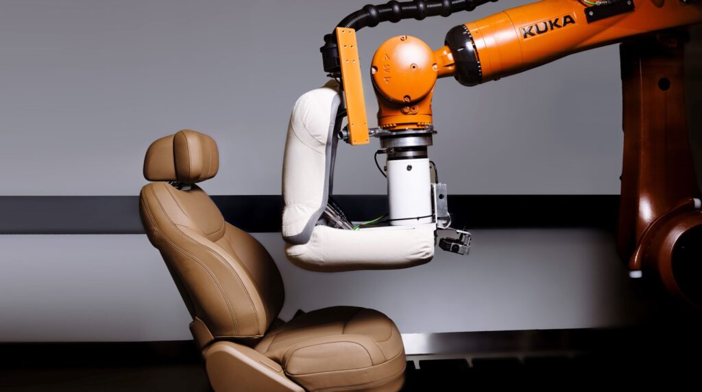JLR showcases advanced seat testing with robots simulating a decade of ...